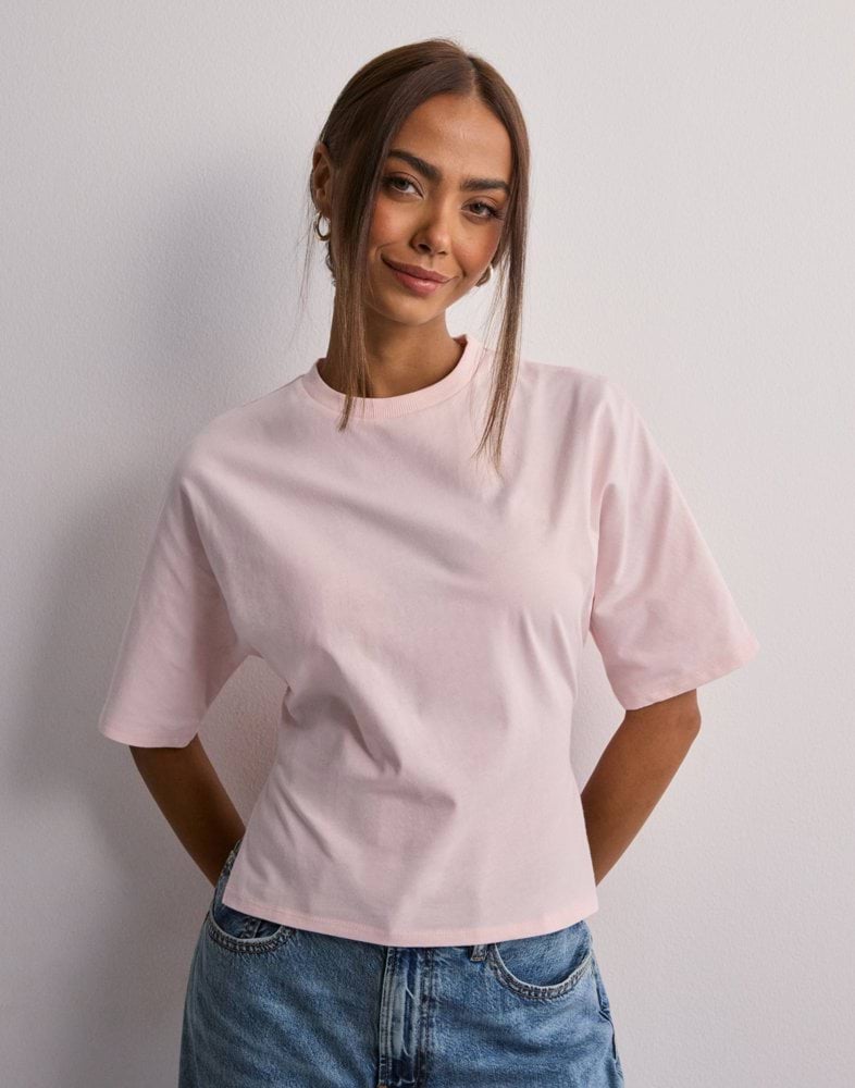 Köp Nelly Open Back Tie Tee - Light Pink | Nelly.com