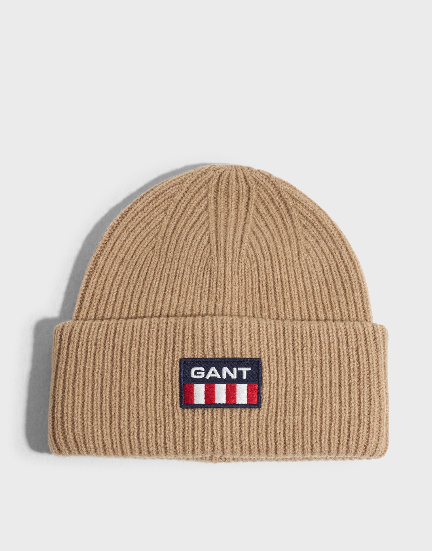 Buy Gant UNISEX. GANT RETRO LOGO BEANIE - Beige | Nelly.com
