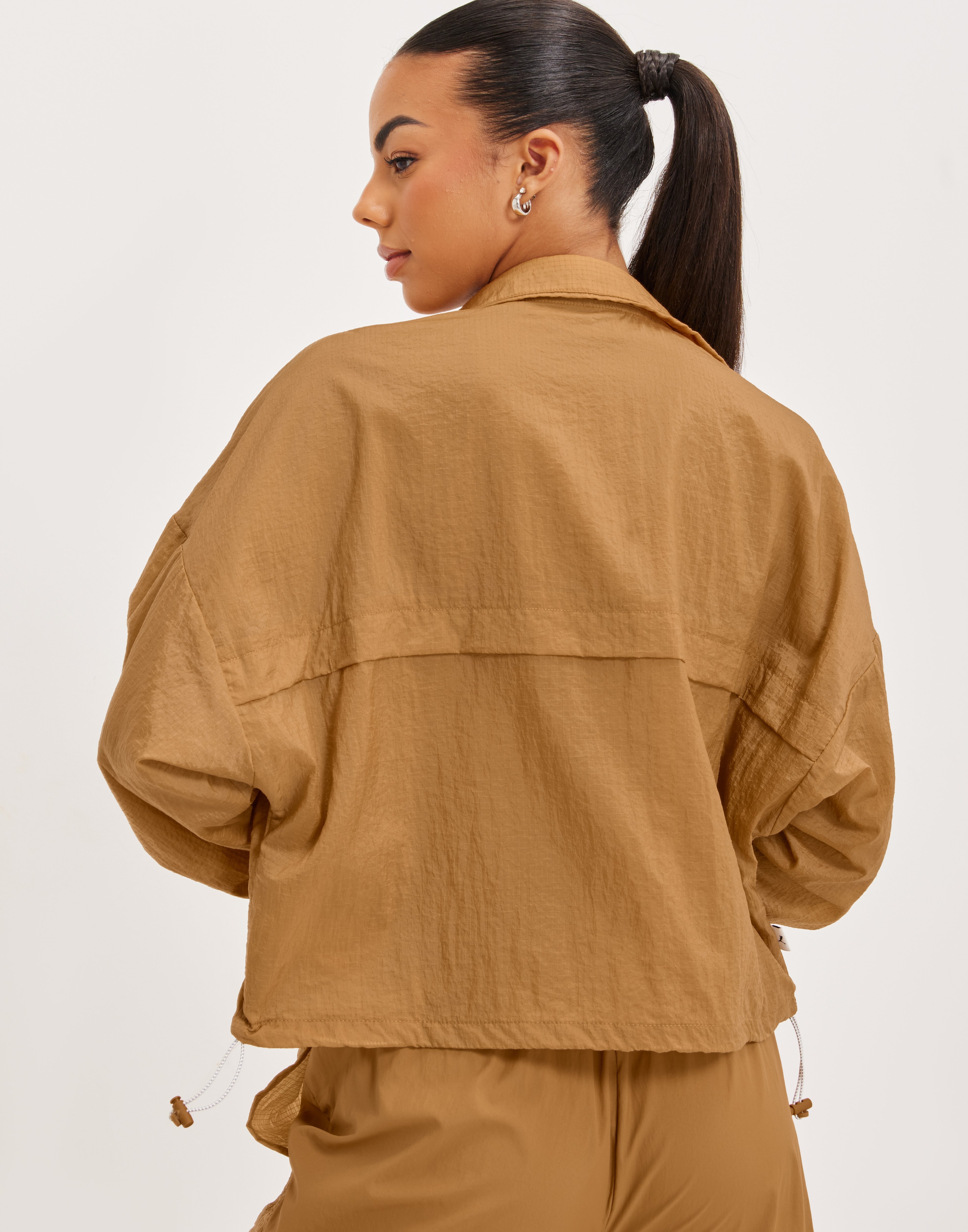 Kjøp Puma INFUSE WOVEN TRACK JACKET - Brown | Nelly.com