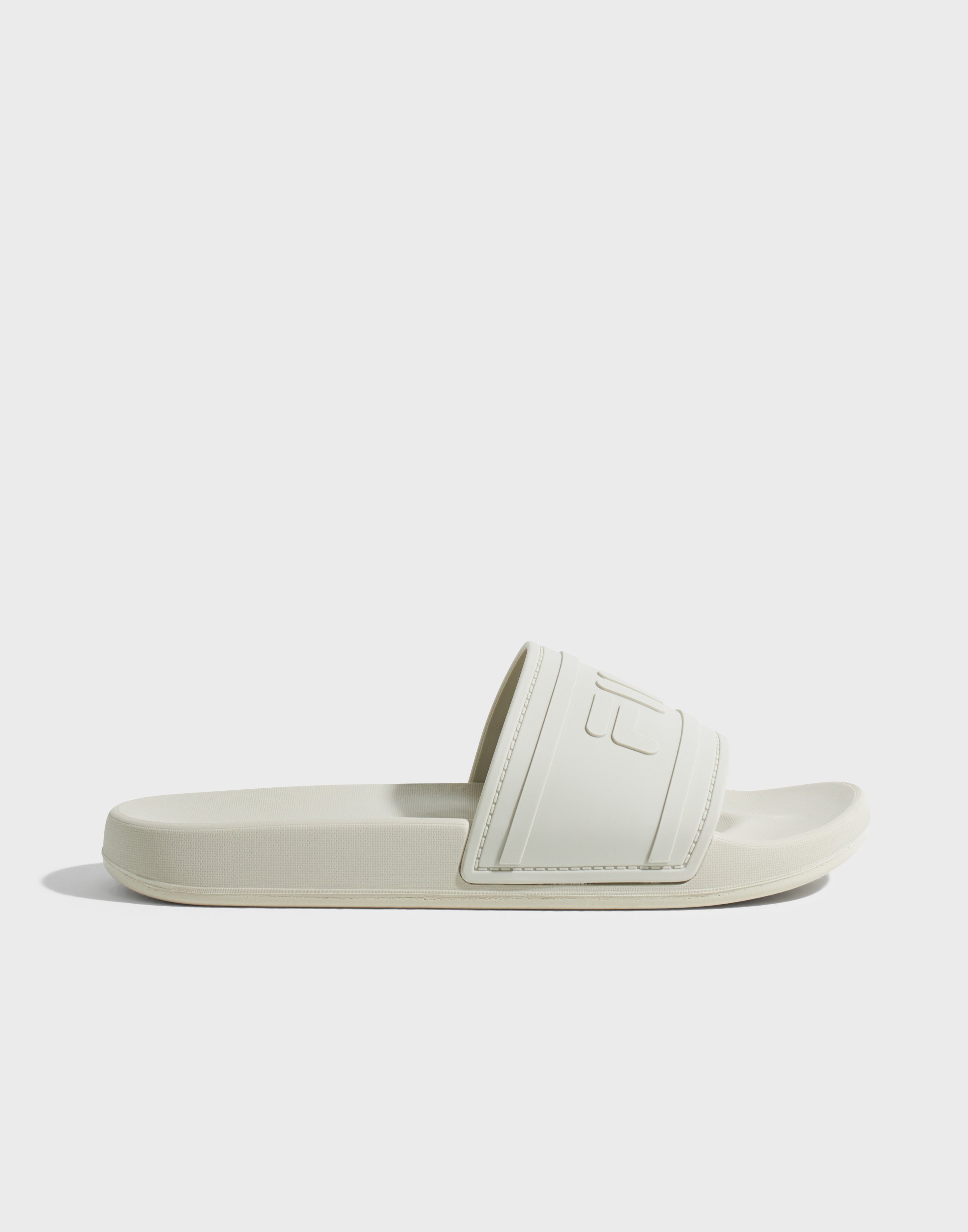Köp Fila MORRO BAY MLD slipper wmn - Bone White | Nelly.com