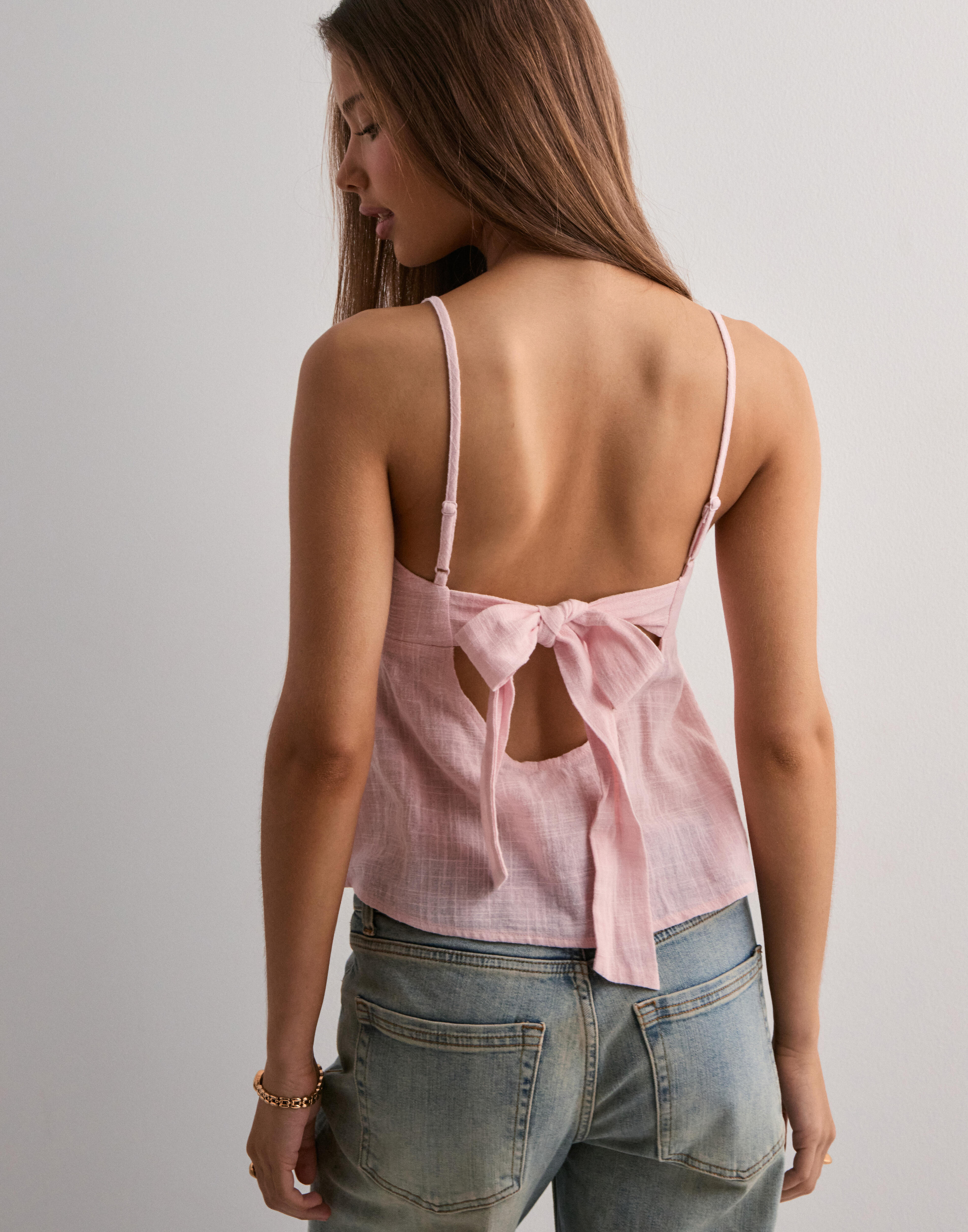 Köp Nelly Flowy Bow Top - Light Pink | Nelly.com