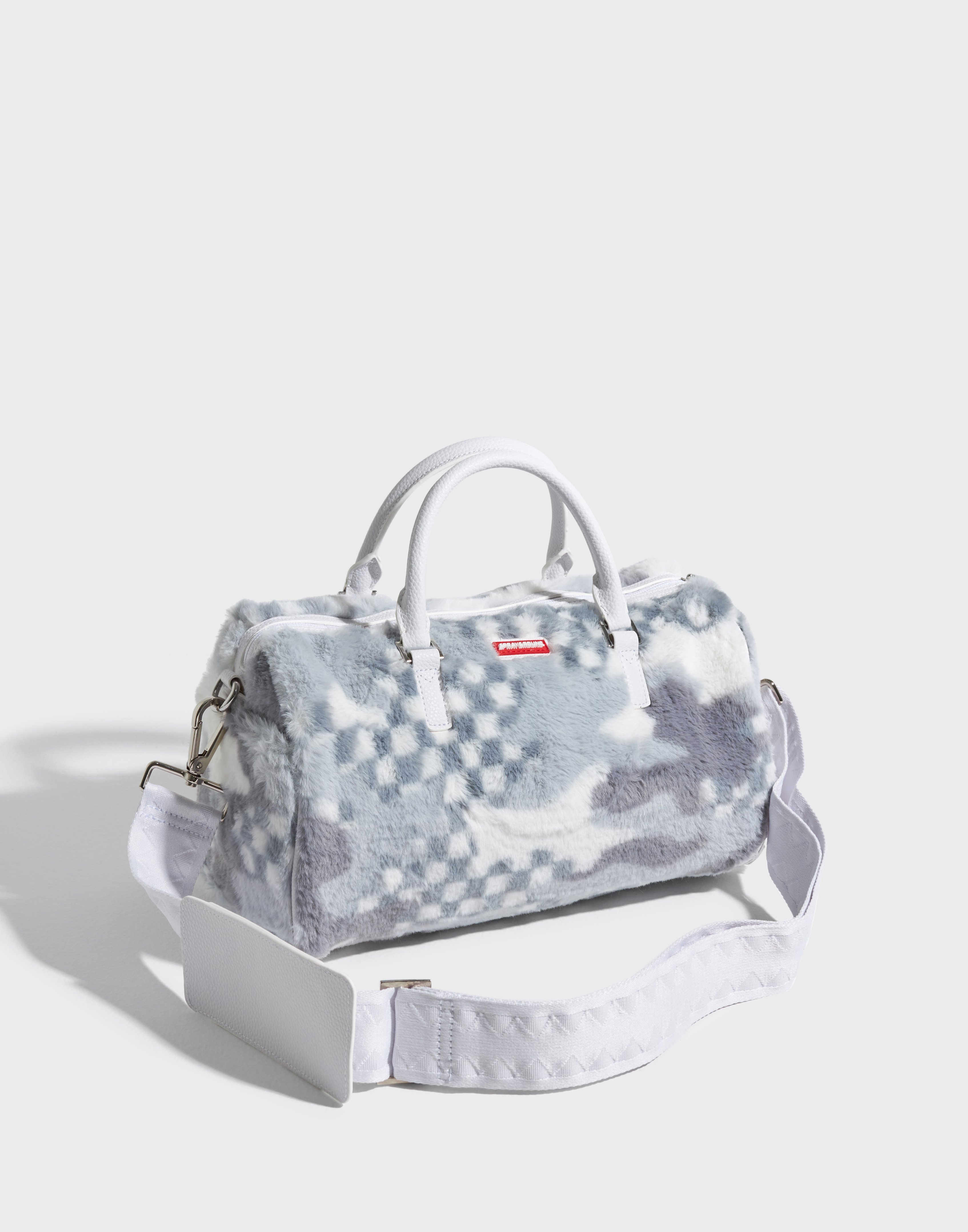 Köp Sprayground WHITE 3AM FUR DUFFEL - White | NLYMAN