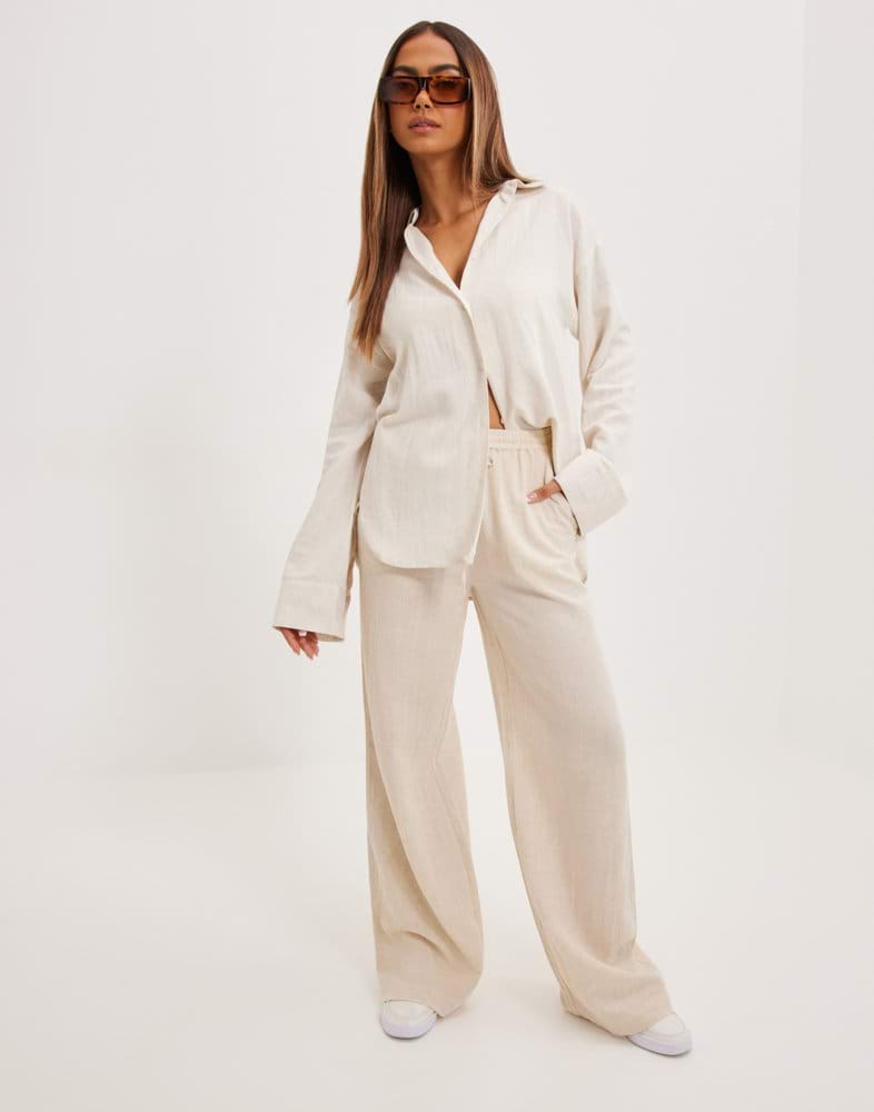 Köp Nelly Flowy Drawstring Linen Pants - Beige | Nelly.com