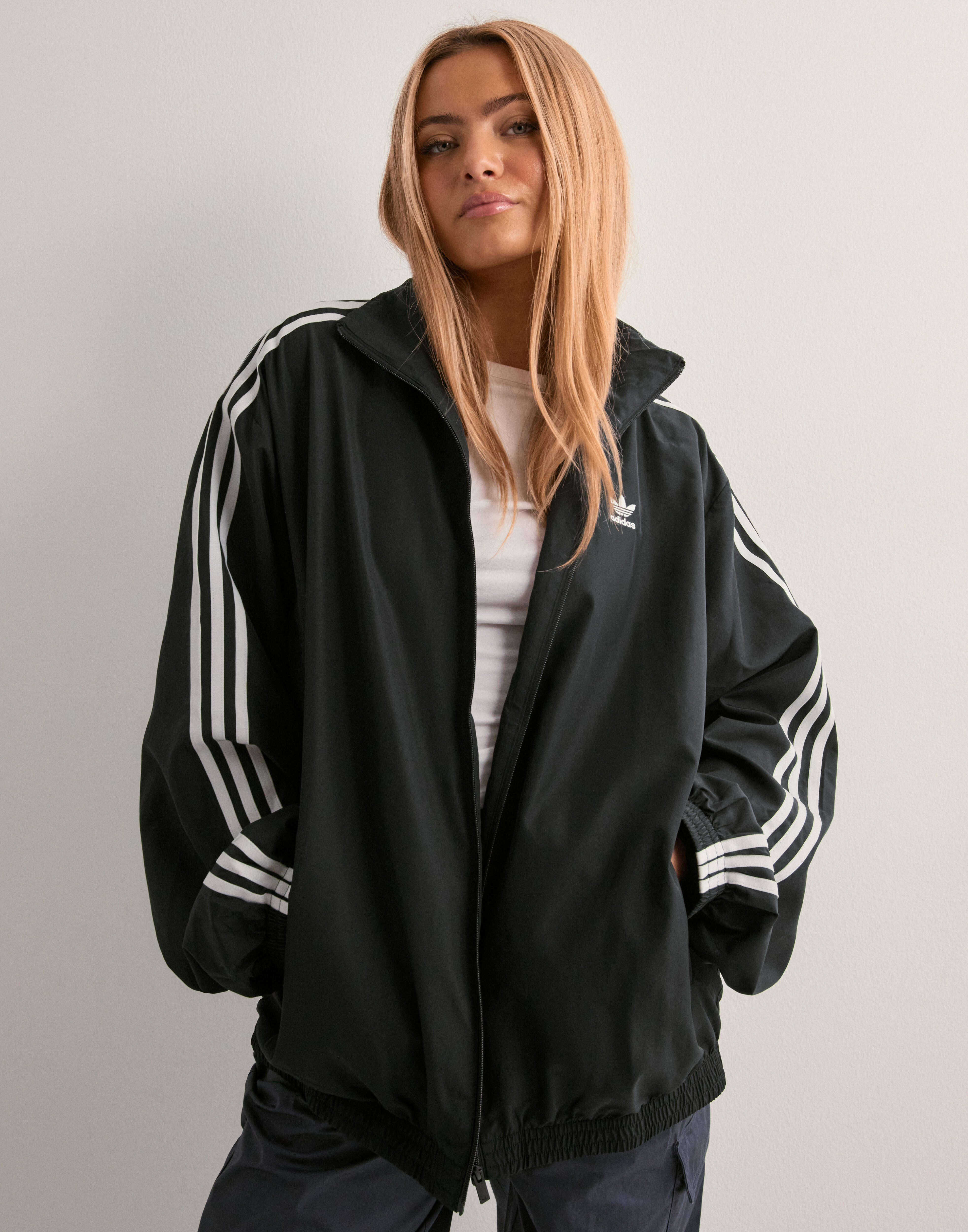Buy Adidas Originals WOVEN TT ZIP - Black | Nelly.com Buy Adidas Originals WOVEN TT ZIP - Black | Nelly.com
