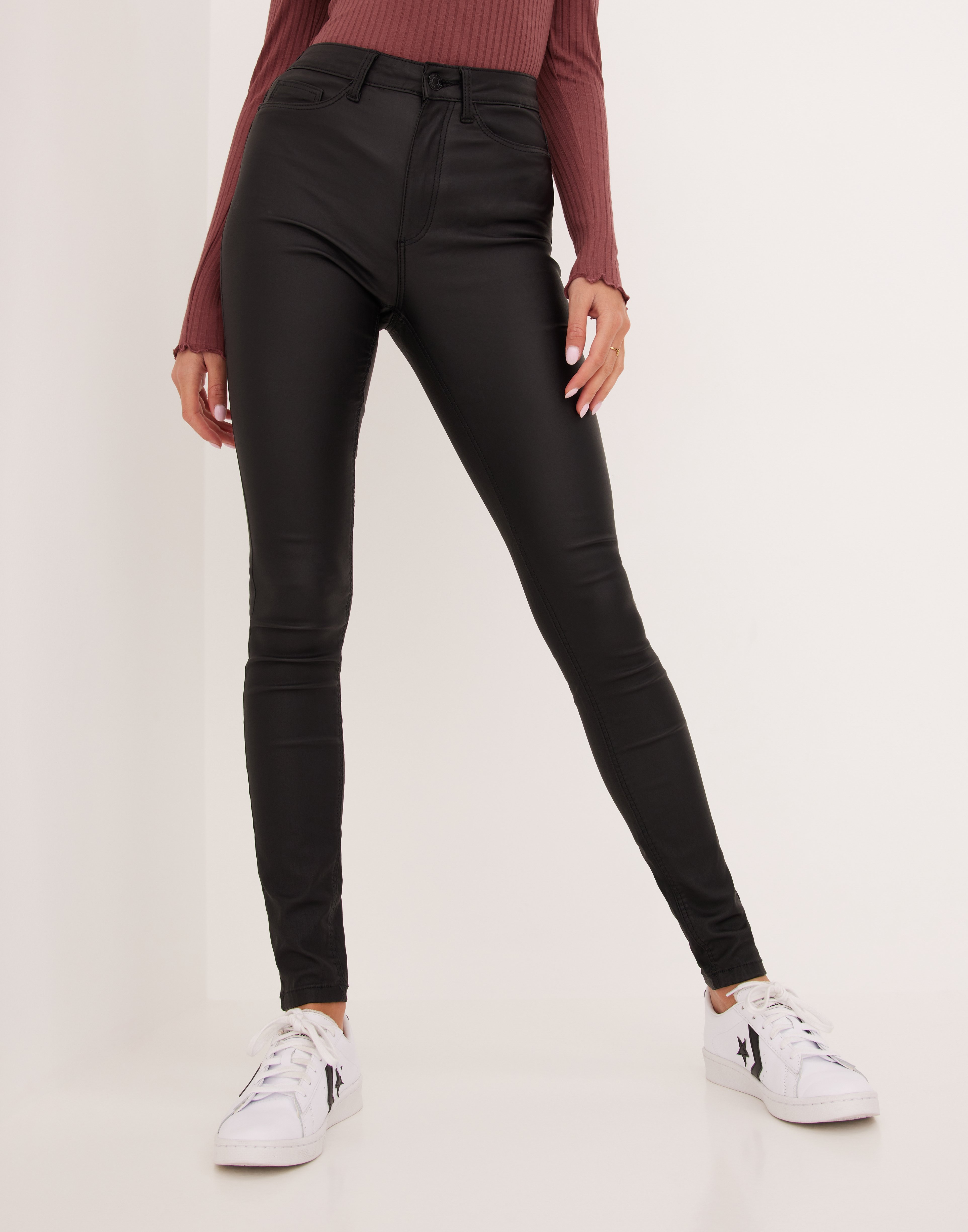 Buy Noisy May NMCALLIE HW SKINNY COATED PANTS NOO - Black | Nelly.com