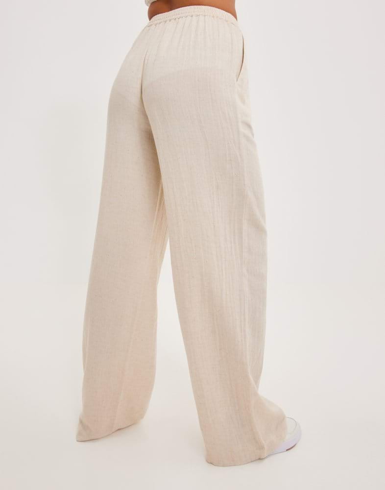 Köp Nelly Flowy Drawstring Linen Pants - Beige | Nelly.com