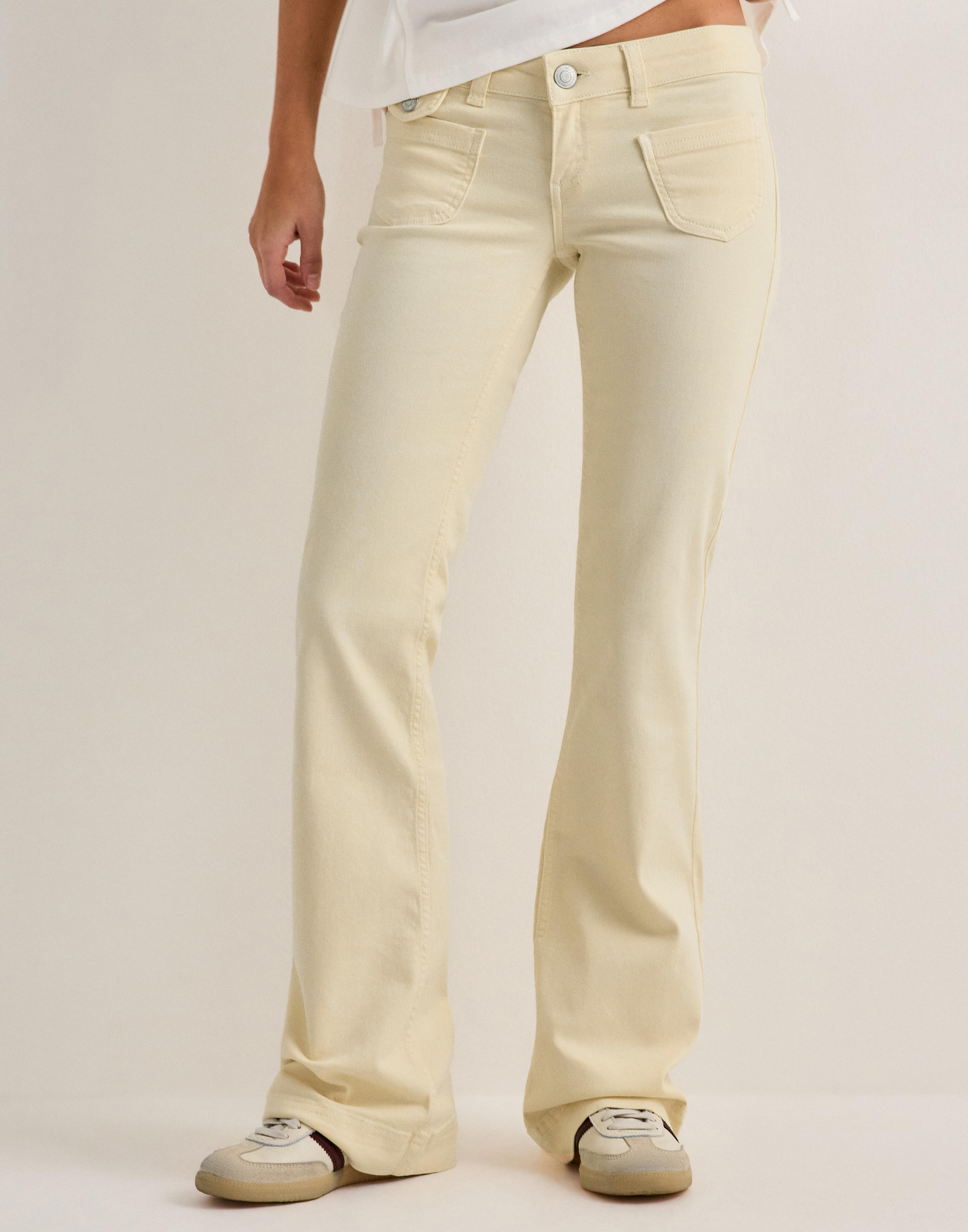 Buy Nelly Super Low Heart Pocket Bootcut Jeans - Light Yellow | Nelly.com